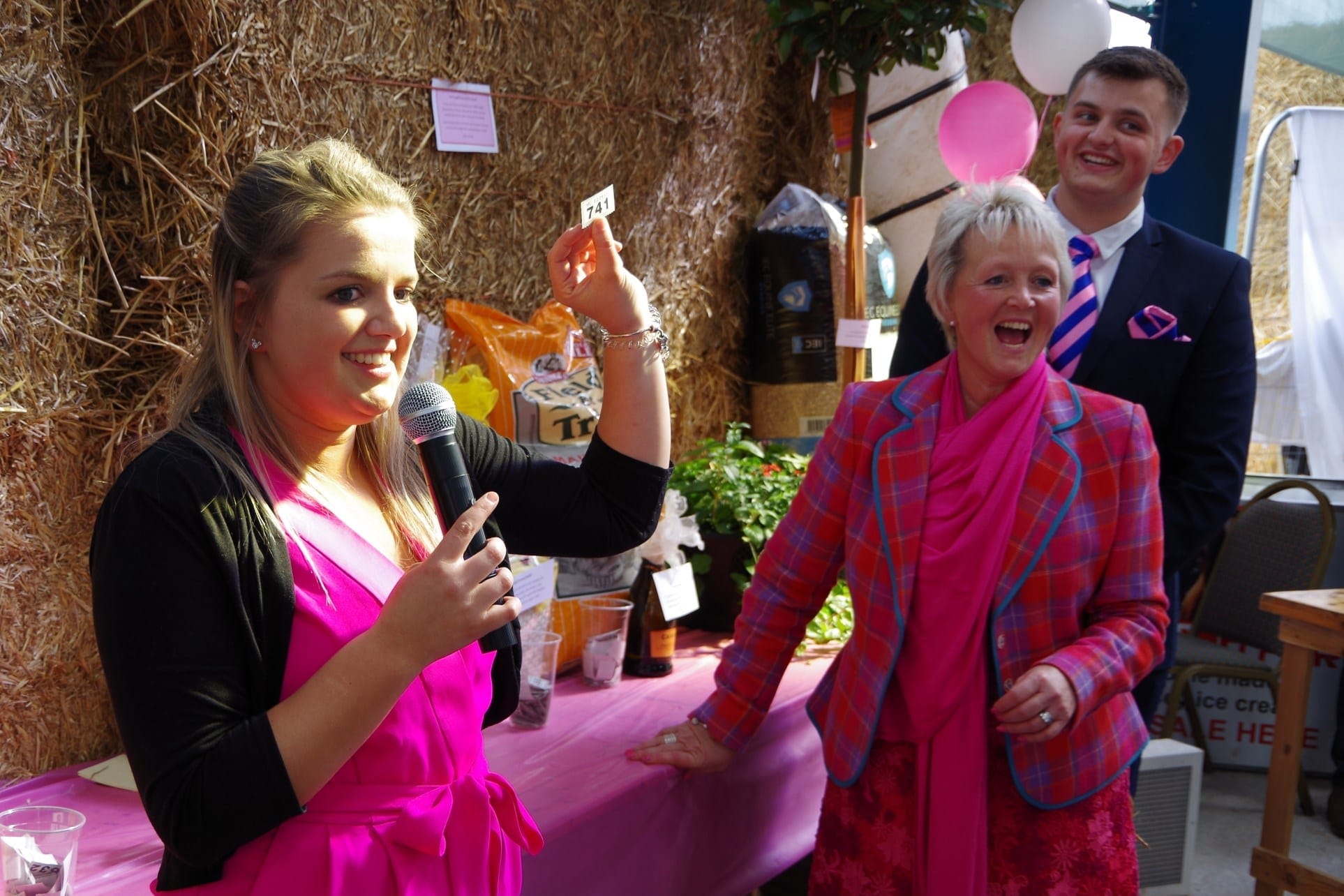 Polly Baines drawing the raffle with her mum Louise Lea, with Bart ...